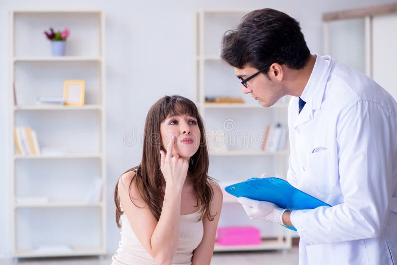 The Doctor Examining the Skin of Female Patient Stock Image - Image of ... The Doctor Examining the Skin of Female Patient Stock Image - Image of ...