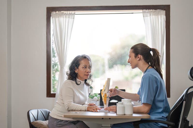 The Doctor Explained, Giving Consultations To Senior Patients Stock Photo - Image of hospital ...