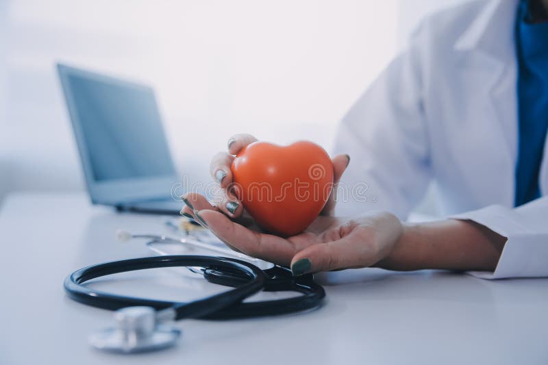 Doctor Explaining Heart To Elderly Patient. Doctor Explaining the Heart ...