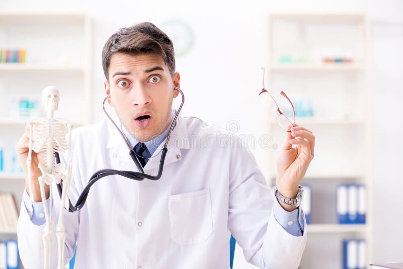 The Doctor Explaining Human Body on Skeleton Stock Image - Image of ...