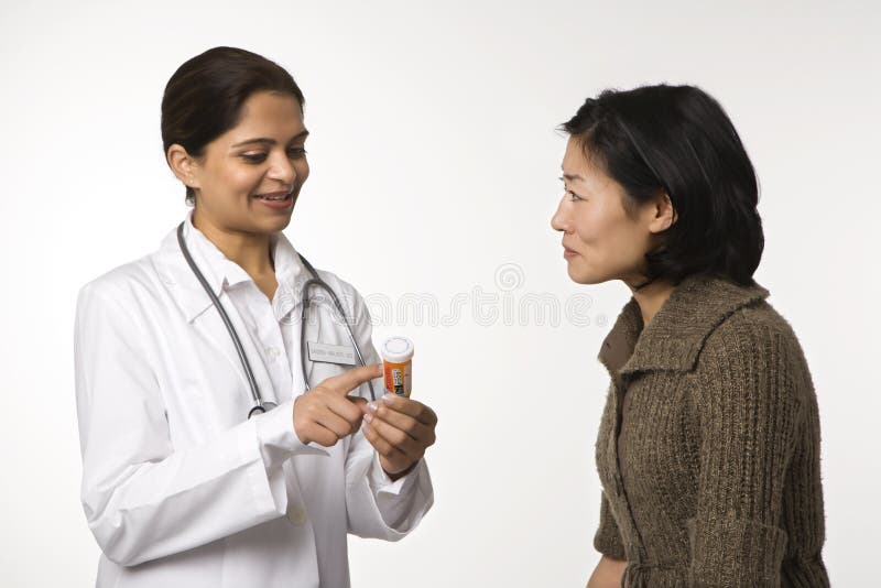 Doctor and Patient Discussing Medication. Stock Image - Image of ...