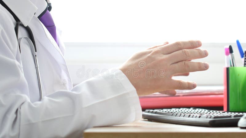 A Doctor Explaining Something by Making Hands Gestures Stock Photo ...