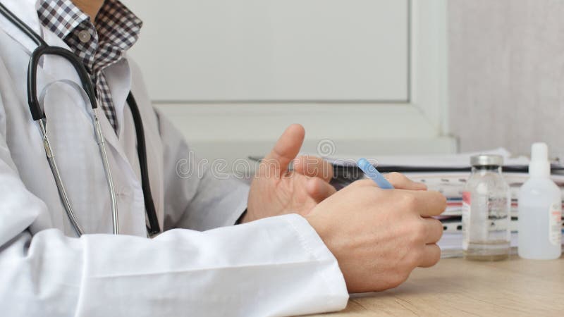 The Doctor Explaining Something for Patient by Making Hands Gestures ...