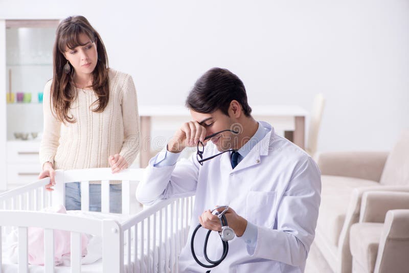 The Doctor Explaining To Young Mother Stock Photo - Image of diagnostic ...