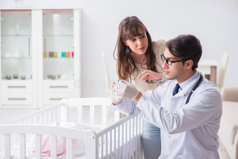 The Doctor Explaining To Young Mother Stock Image - Image of physician ...