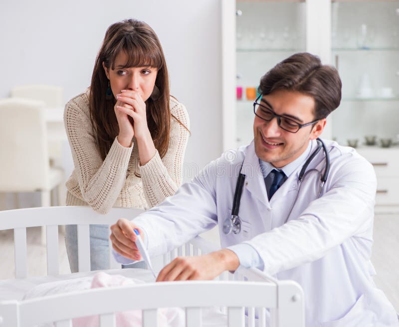 Doctor Explaining To Young Mother Stock Image - Image of parent ...