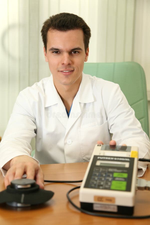 Doctor with fat measurer stock image. Image of happy, healthcare - 2229131