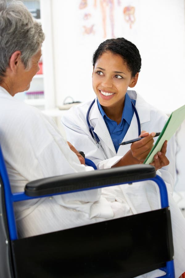 Doctor with female patient stock photo. Image of healthcare - 19905780