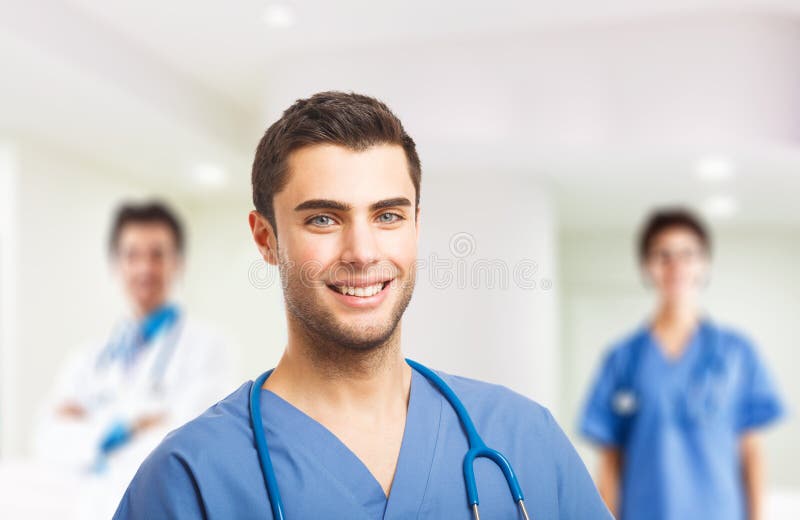Doctor in Front of His Medical Team Stock Image - Image of clinic ... Doctor in Front of His Medical Team Stock Image - Image of clinic ...