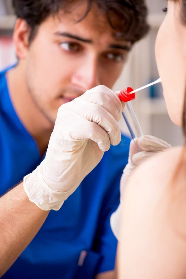The Doctor Getting Saliva Test Sample in Clinic Hospital Stock Photo ...
