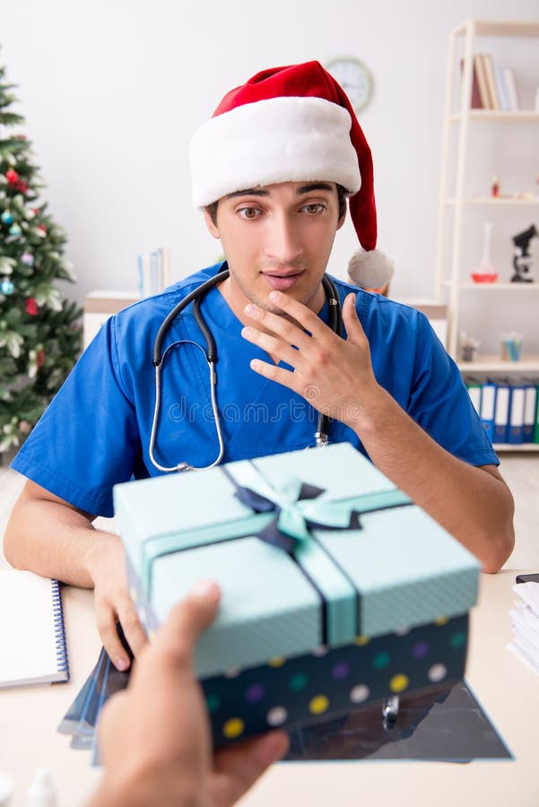 The Doctor with Gift Box in the Hospital Stock Image - Image of ...