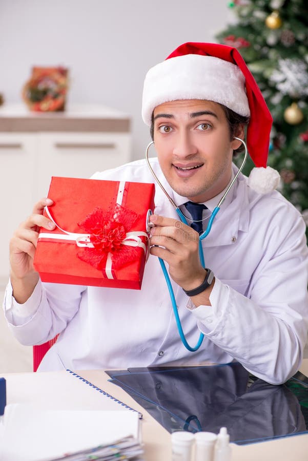The Doctor with Gift Box in the Hospital Stock Photo - Image of party ...
