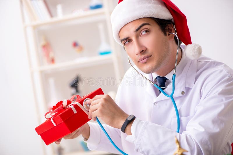 The Doctor with Gift Box in the Hospital Stock Image - Image of giving ...