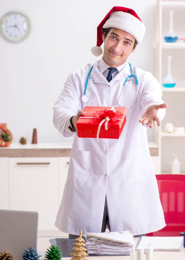 Doctor with Gift Box in the Hospital Stock Photo - Image of medical ...