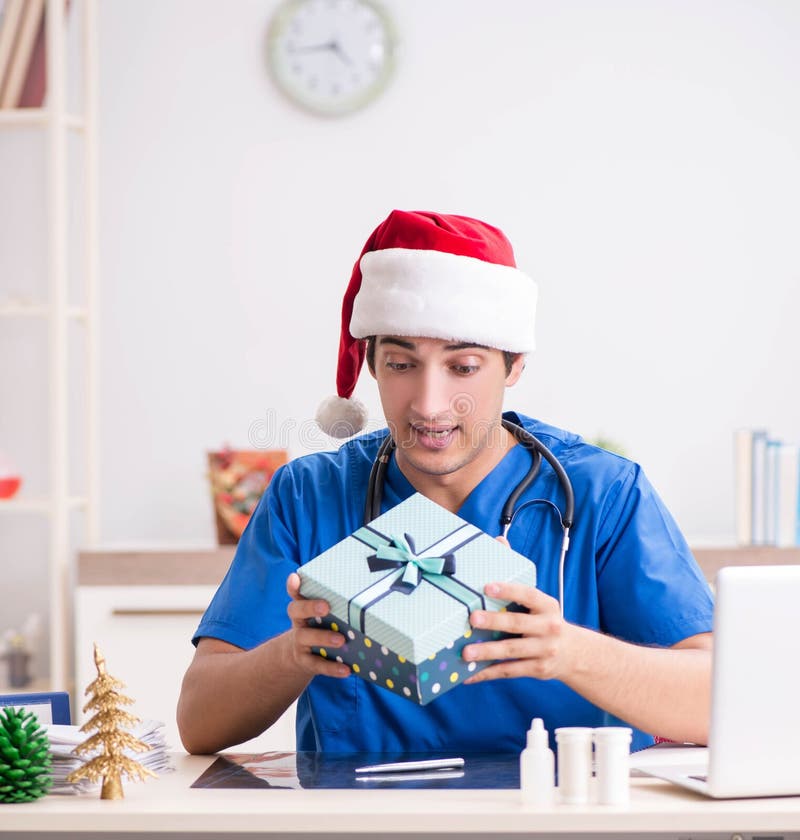 Doctor with Gift Box in the Hospital Stock Image - Image of laboratory ...