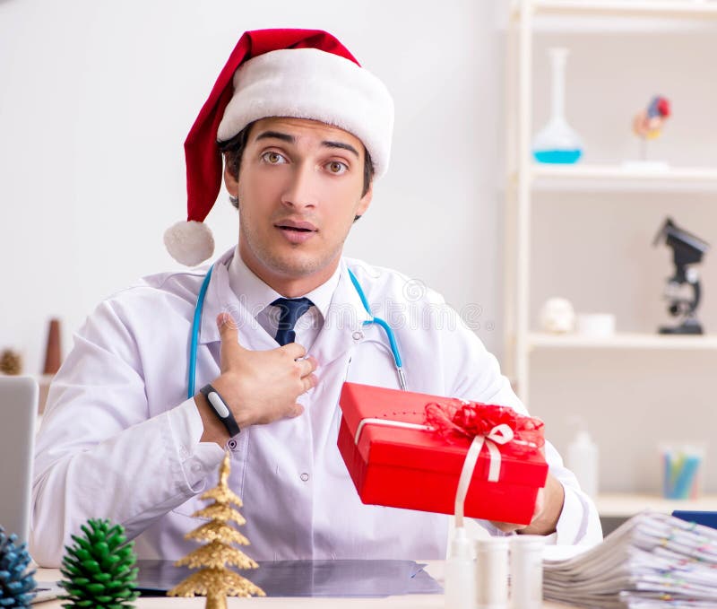 Doctor with Gift Box in the Hospital Stock Photo - Image of ...