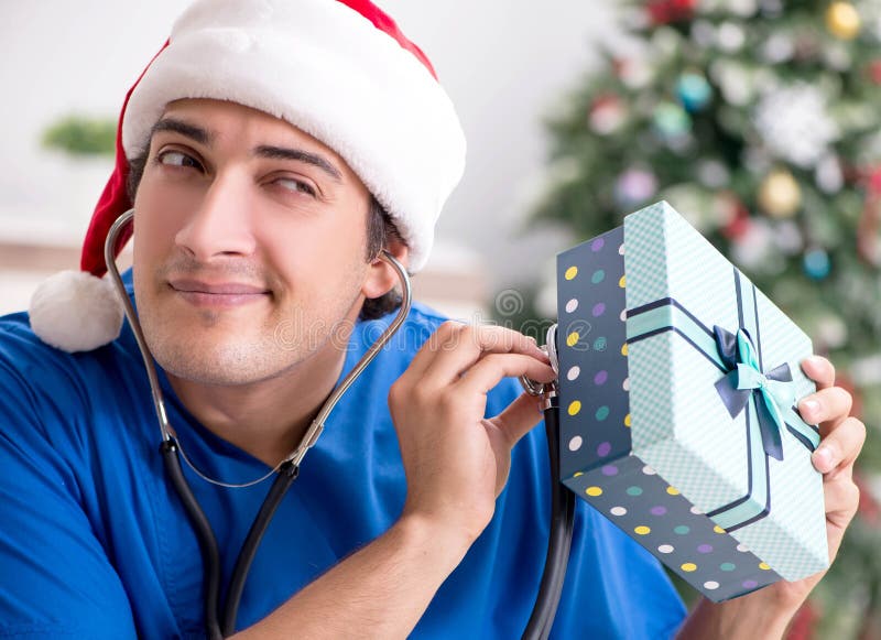 Doctor with Gift Box in the Hospital Stock Photo - Image of exam ...