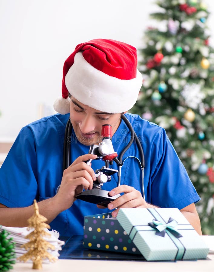 Doctor with Gift Box in the Hospital Stock Photo - Image of healthcare ...
