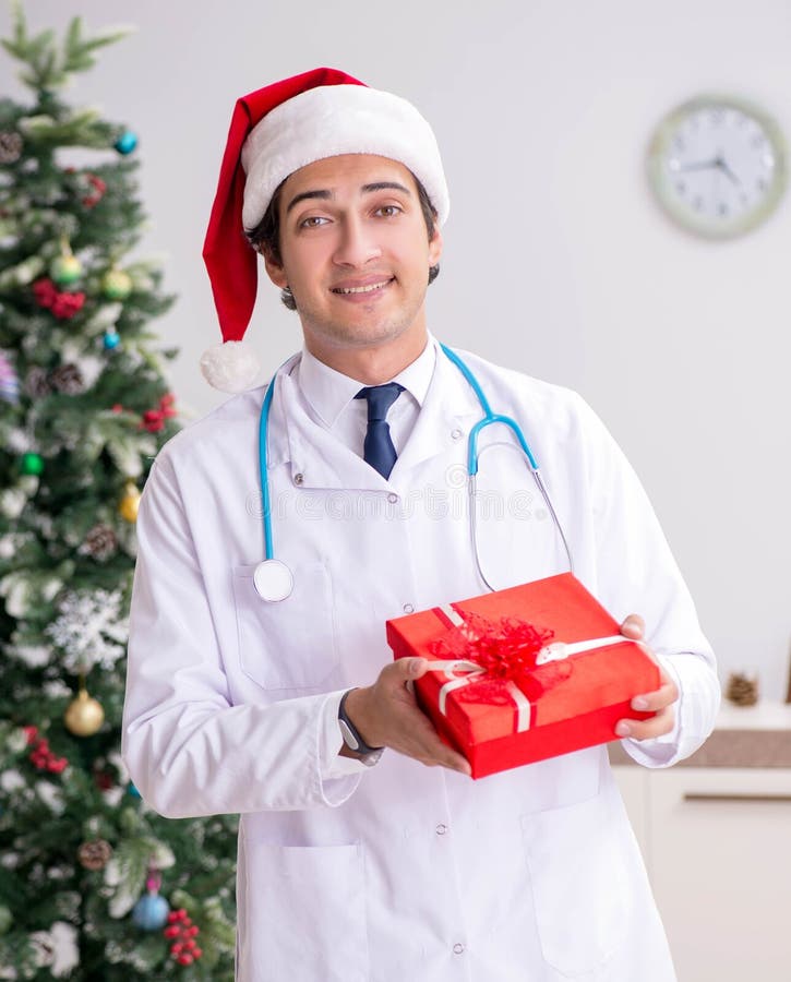 Doctor with Gift Box in the Hospital Stock Image - Image of exchanging ...