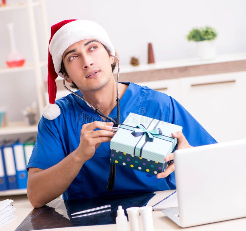 Doctor with Gift Box in the Hospital Stock Photo - Image of physician ...
