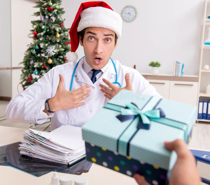 Doctor with Gift Box in the Hospital Stock Photo - Image of health ...