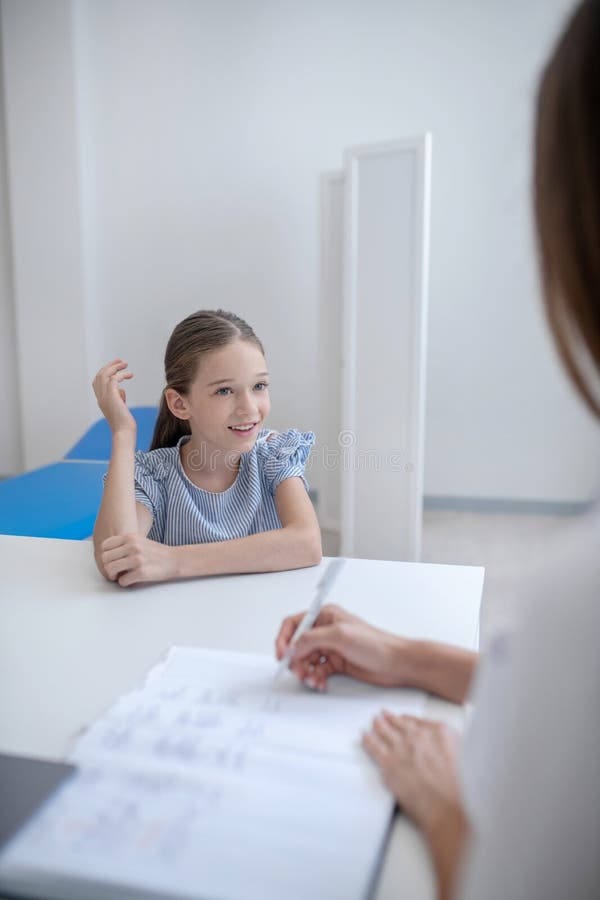 Girl Having a Tutorial in the Clinic with a Female Doctor and Looking ...