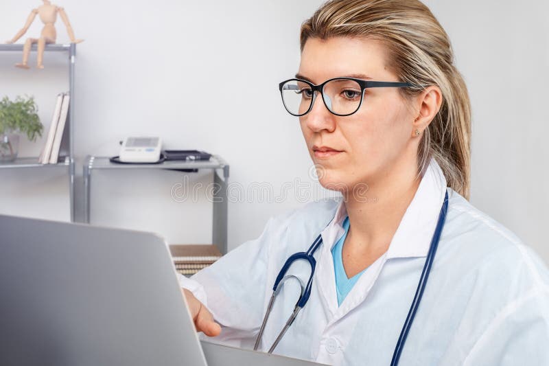 Doctor Girl Working on a Computer Stock Photo - Image of distancing ...