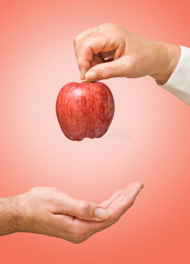 Doctor giving apple stock photo. Image of healthy, gift - 16496198