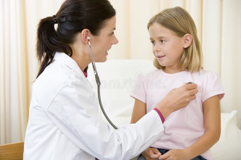 Doctor Giving Checkup To Baby in Exam Room Stock Image - Image of ...