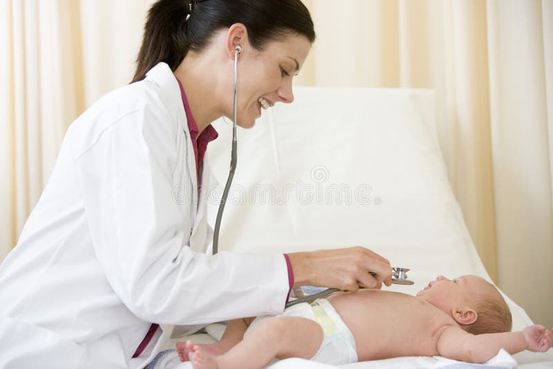 Doctor Giving Checkup To Baby in Exam Room Stock Image - Image of ...