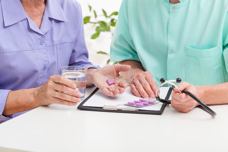 Doctor giving drugs stock photo. Image of diagnosis, holding - 32907052