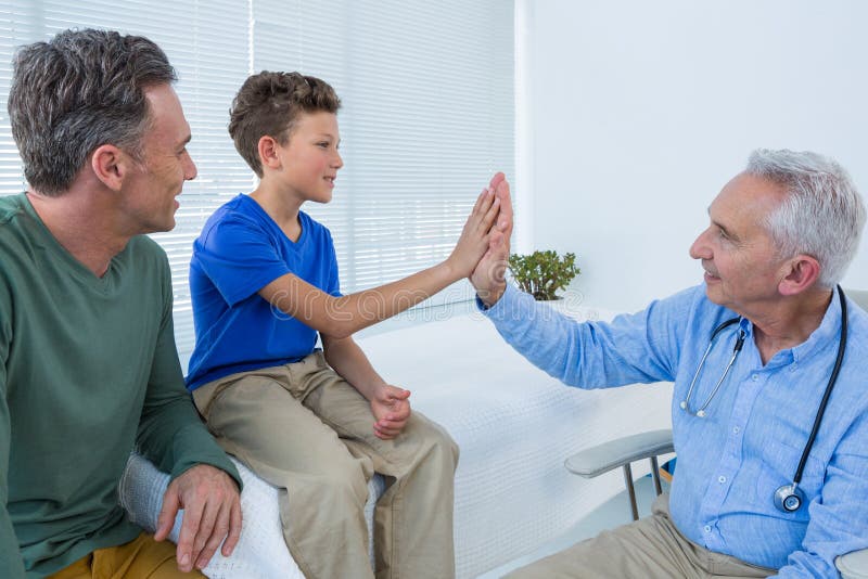 285 Doctor Patient Giving High Five Stock Photos - Free & Royalty-Free ...
