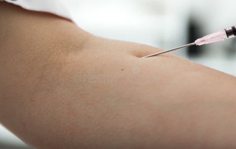 Doctor Giving an Injection To a Patient Stock Photo - Image of female ...