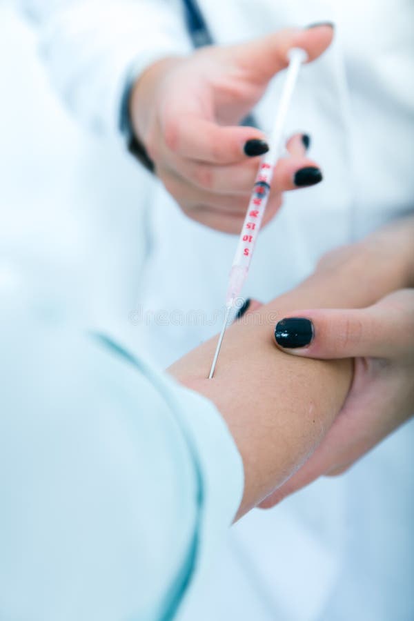Doctor Giving an Injection To a Patient. Stock Photo - Image of ...