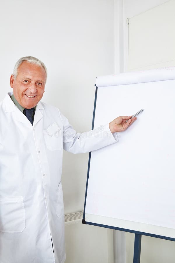 Doctor Giving Presentation with Flipboard Stock Image - Image of ...