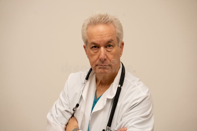 Doctor Giving a Serious Look at Camera Stock Photo - Image of portrait ...