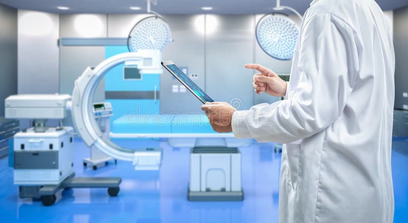 Doctor with Graphic Interface Display in Hospital Room with Medical ...