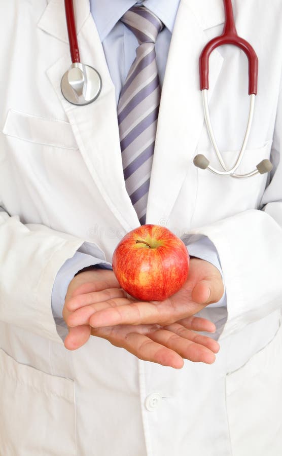 Doctor hand with a apple stock photo. Image of illness - 21888752