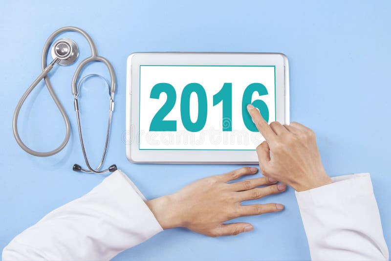 Doctor Hand Touching Number 2016 on the Tablet Stock Image - Image of ...