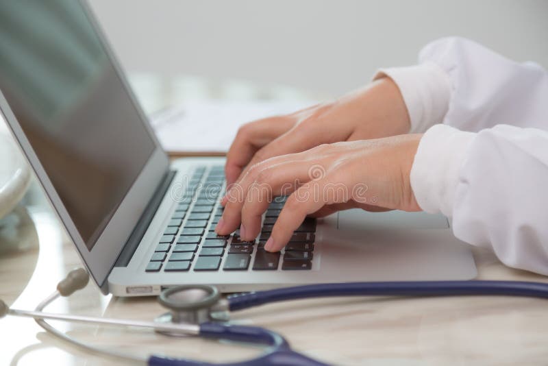 Doctor hands typing stock image. Image of male, online - 55668231