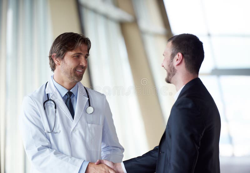 Doctor Handshake with a Patient Stock Photo - Image of beard, handshake ...