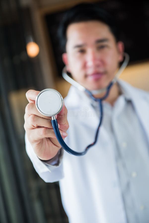 Doctor with Heart Disease Checker Stock Image - Image of device ...