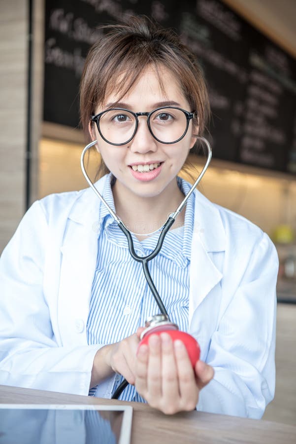 Doctor with Heart Disease Checker Stock Image - Image of doctor ...