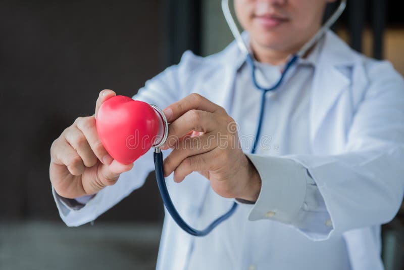 Doctor with Heart Disease Checker Stock Image - Image of examination ...