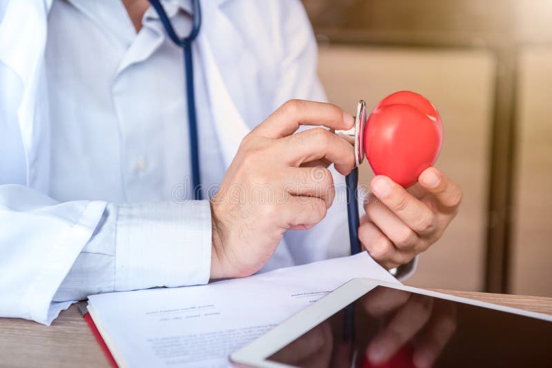 Doctor with Heart Disease Checker Stock Image - Image of checkup ...