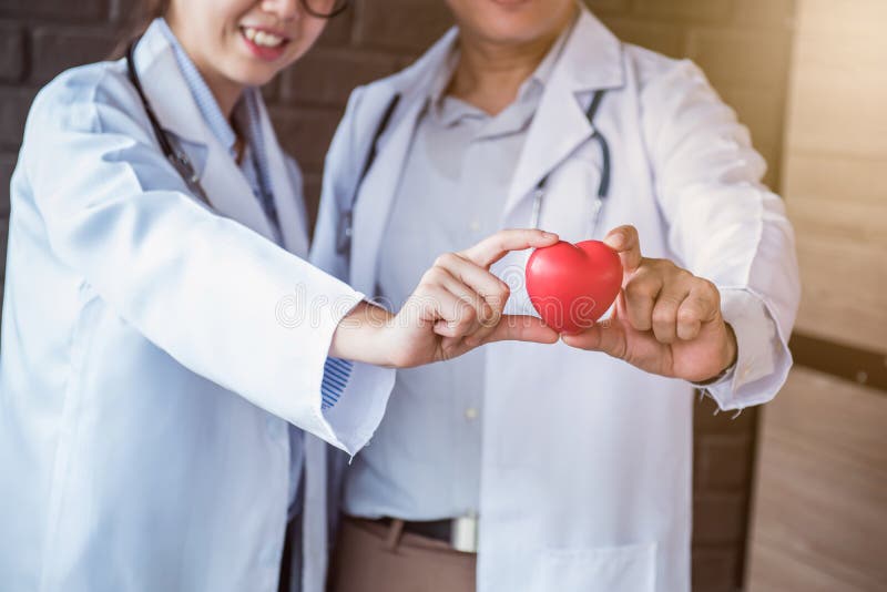 Doctor with Heart Disease Checker Stock Photo - Image of care ...