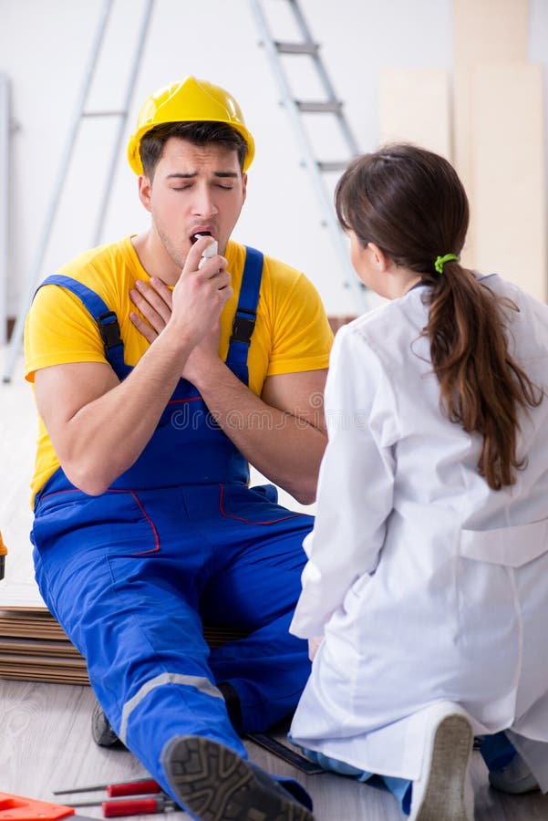 The Doctor Helping Injured Worker at Construction Site Stock Image ...