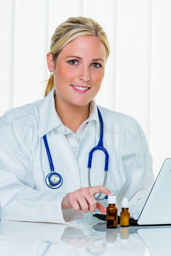 Physician in Practice with Stethoscope and Laptop. Stock Photo - Image ...