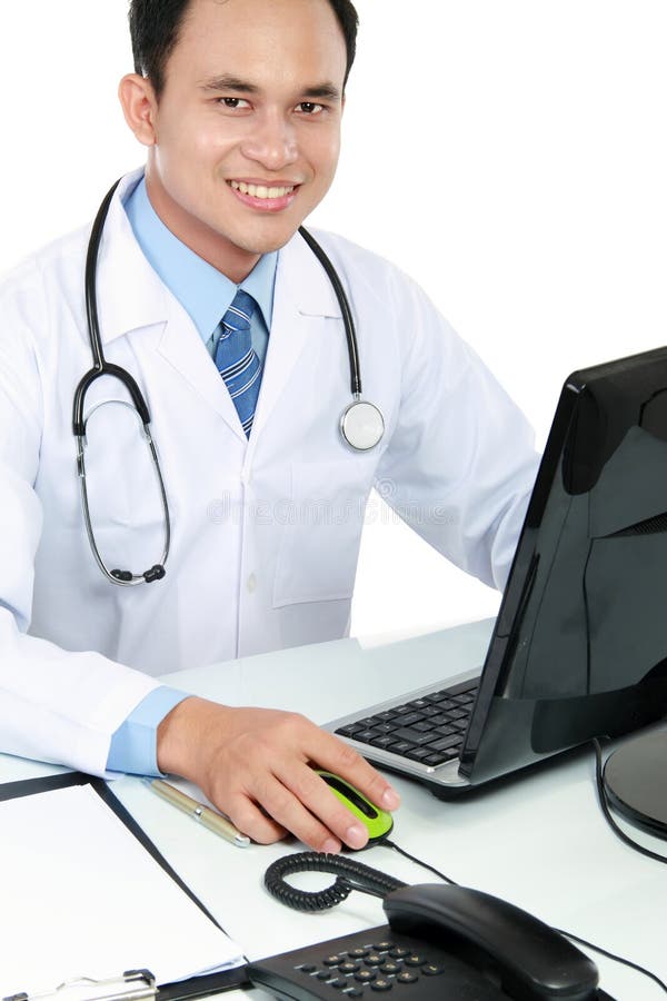Doctor at His Desk in Front of Computer Stock Image - Image of computer ...