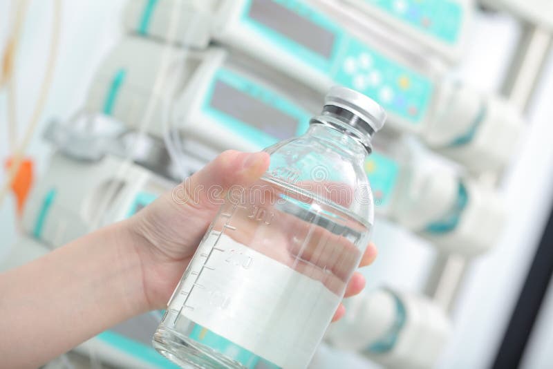 Doctor Holding a Bottle of Solution Stock Image - Image of care ...